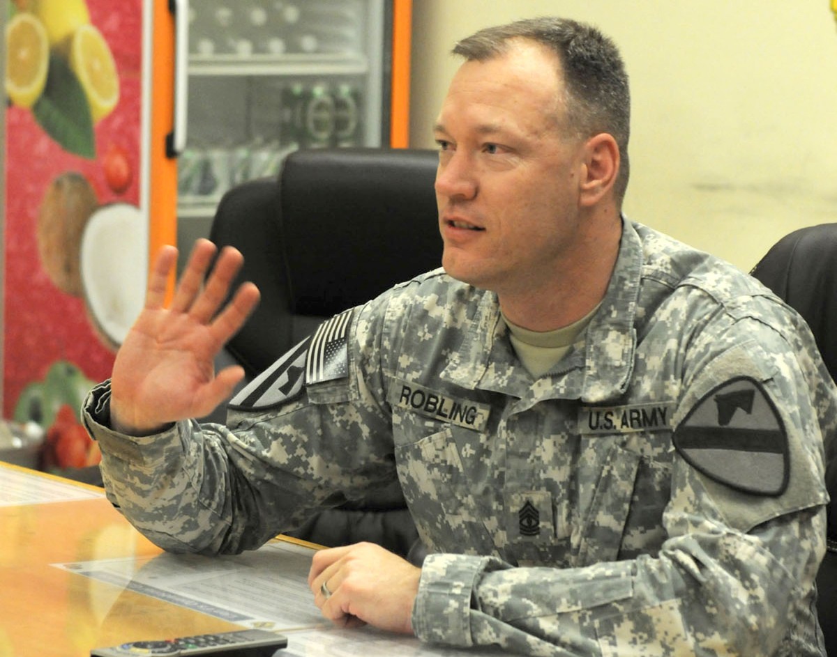 Deployed dad watches daughter graduate high school via teleconference ...