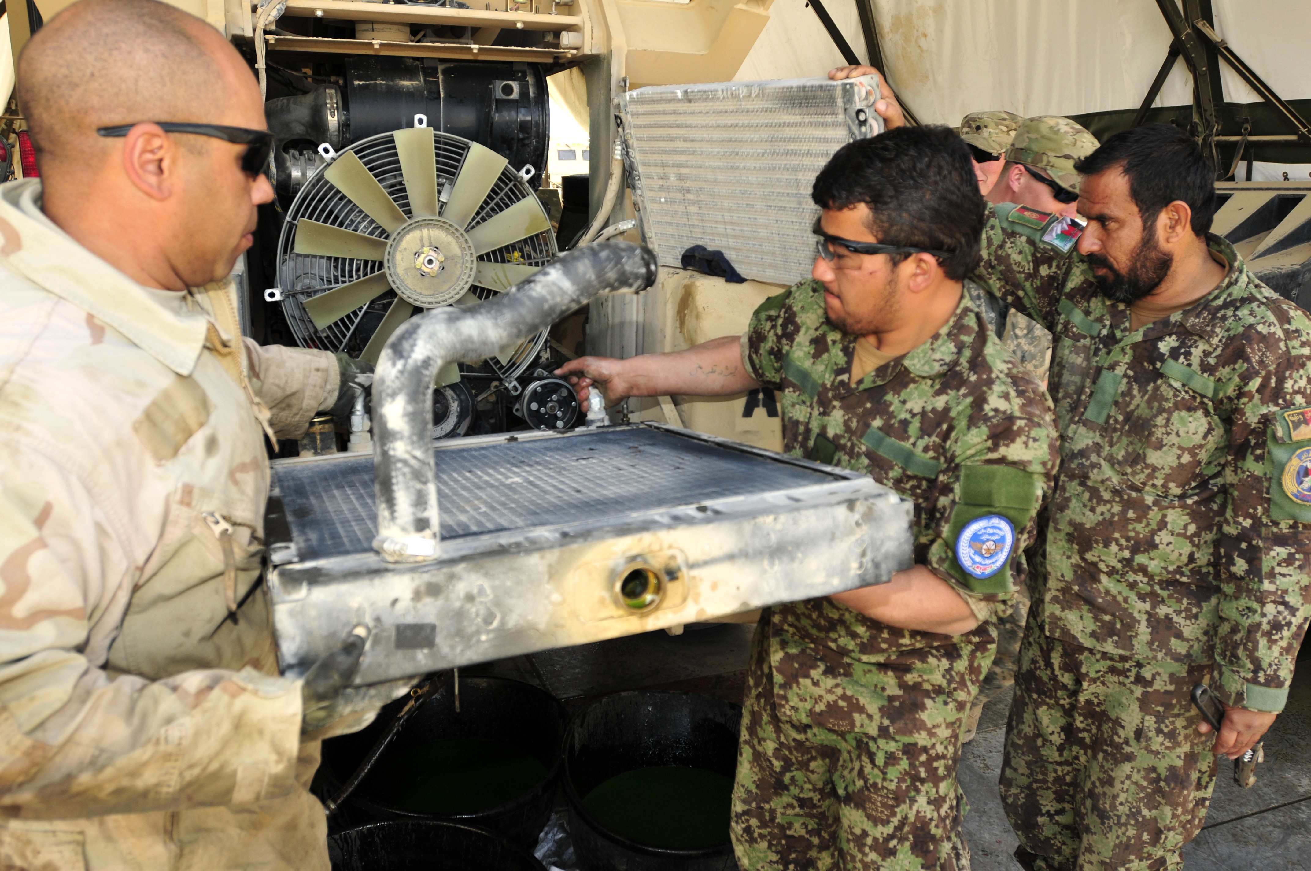 Afghan National Army Soldiers, 25th CAB turn Wrenches Together ...