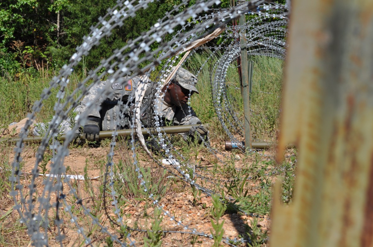 Engineer Soldier breaches obstacle | Article | The United States Army