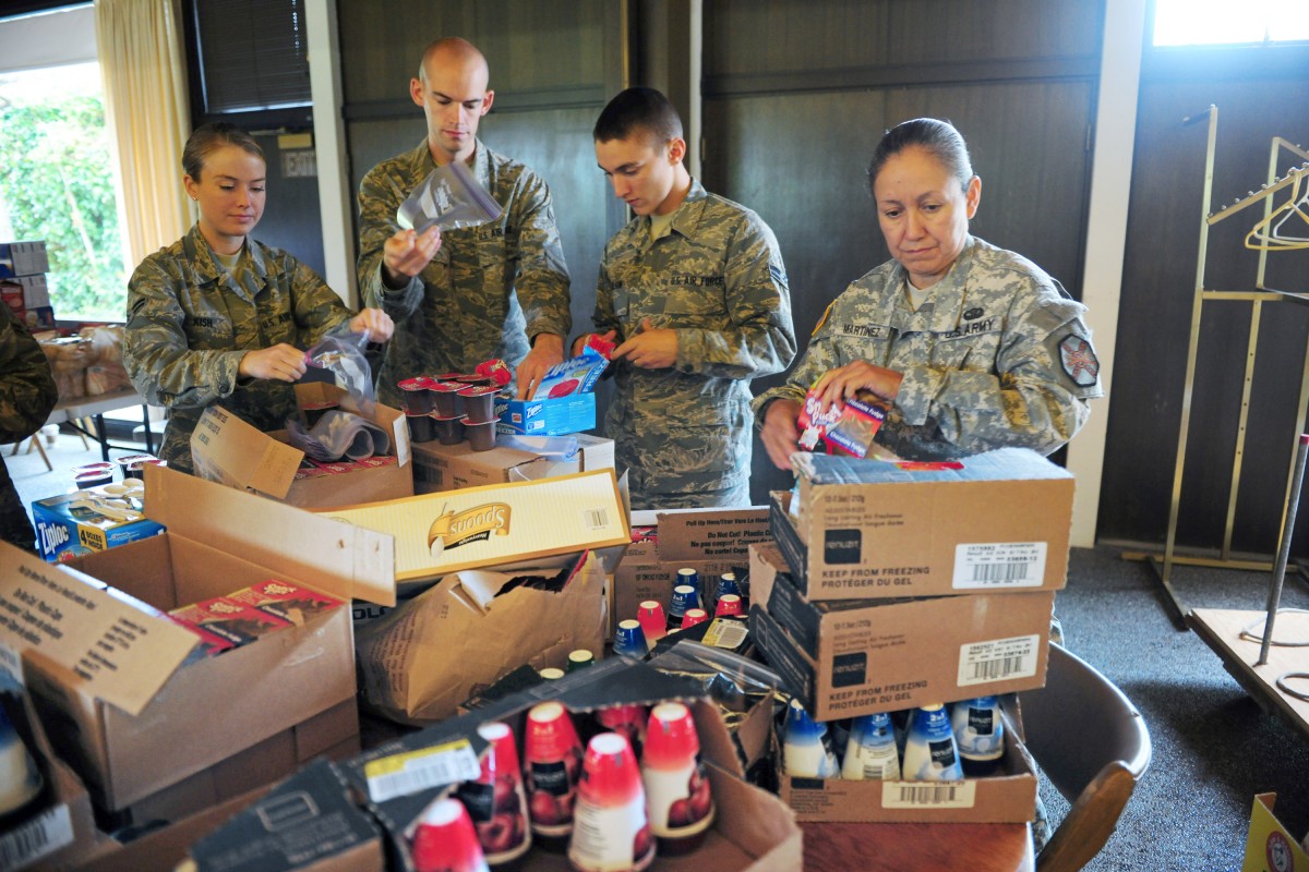 Community gathers to pack boxes for deployed troops | Article | The ...