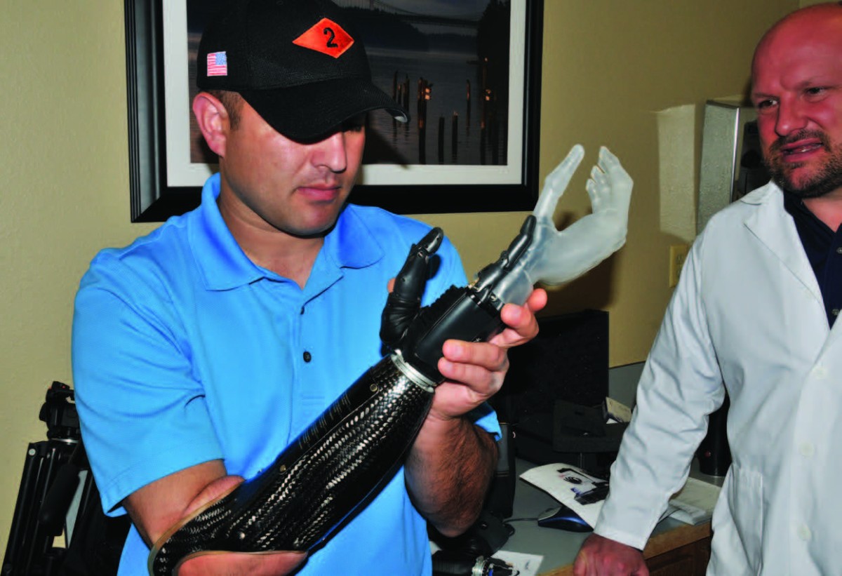 Medal of Honor recipient aided by prosthetics brings help, hope to ...