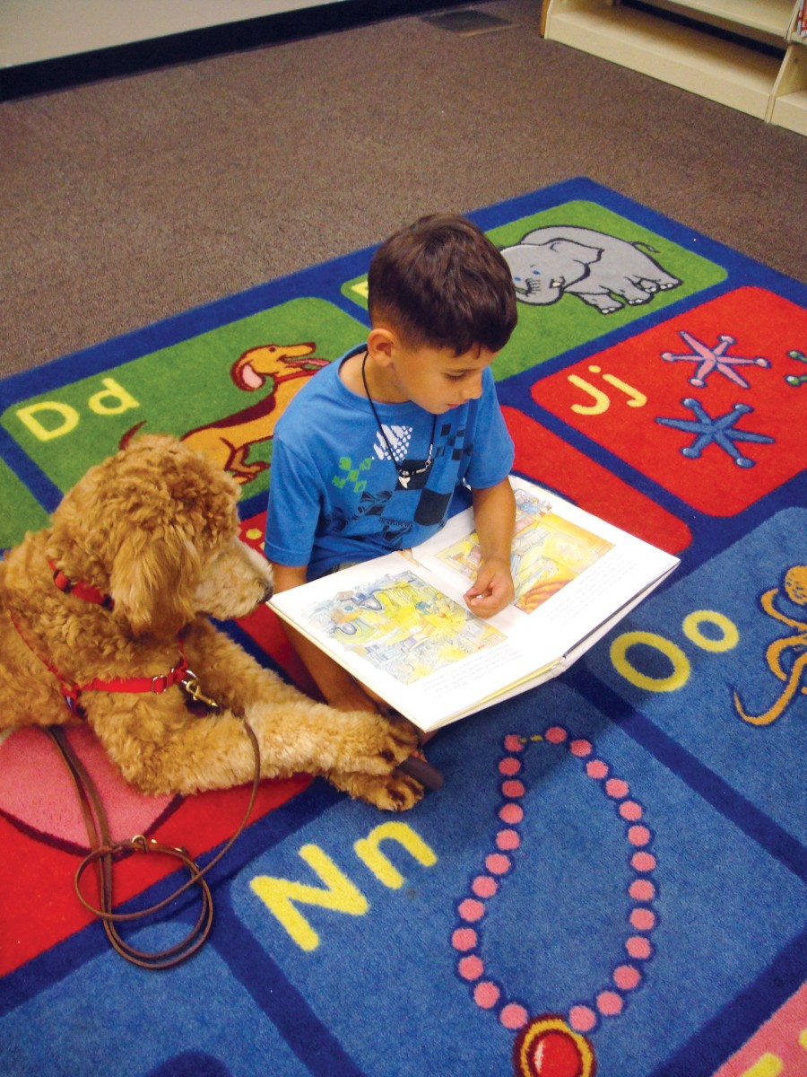 "Read to the Dogs" teaches that learning to read is a "dog" gone good ...