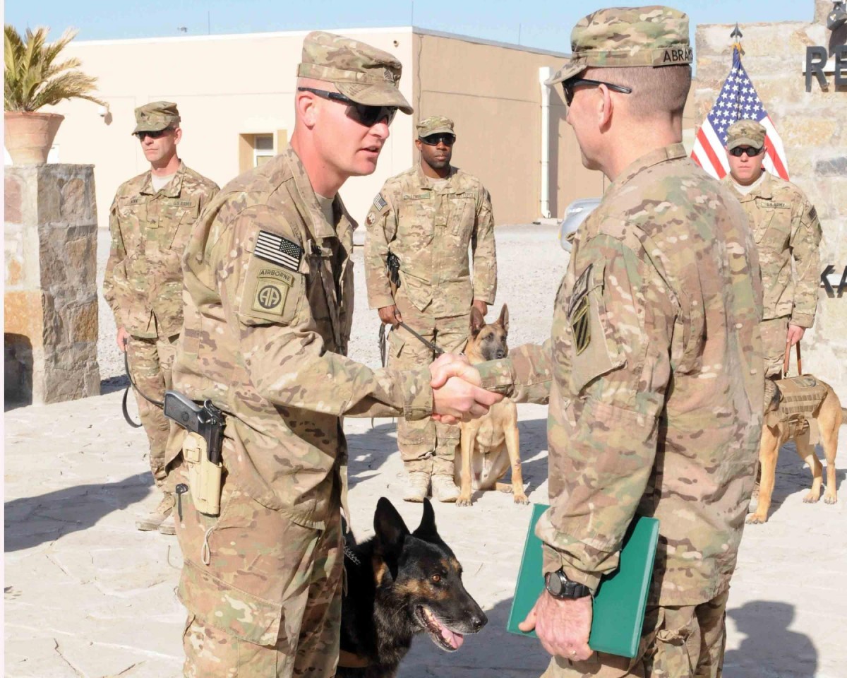 Military Working Dog handler re-enlists | Article | The United States Army