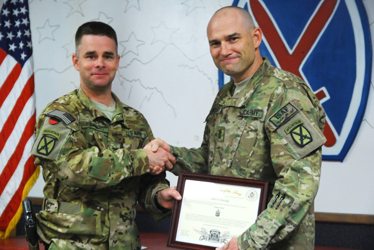 Soldier on fifth deployment receives top enlisted rank, Family watches ...