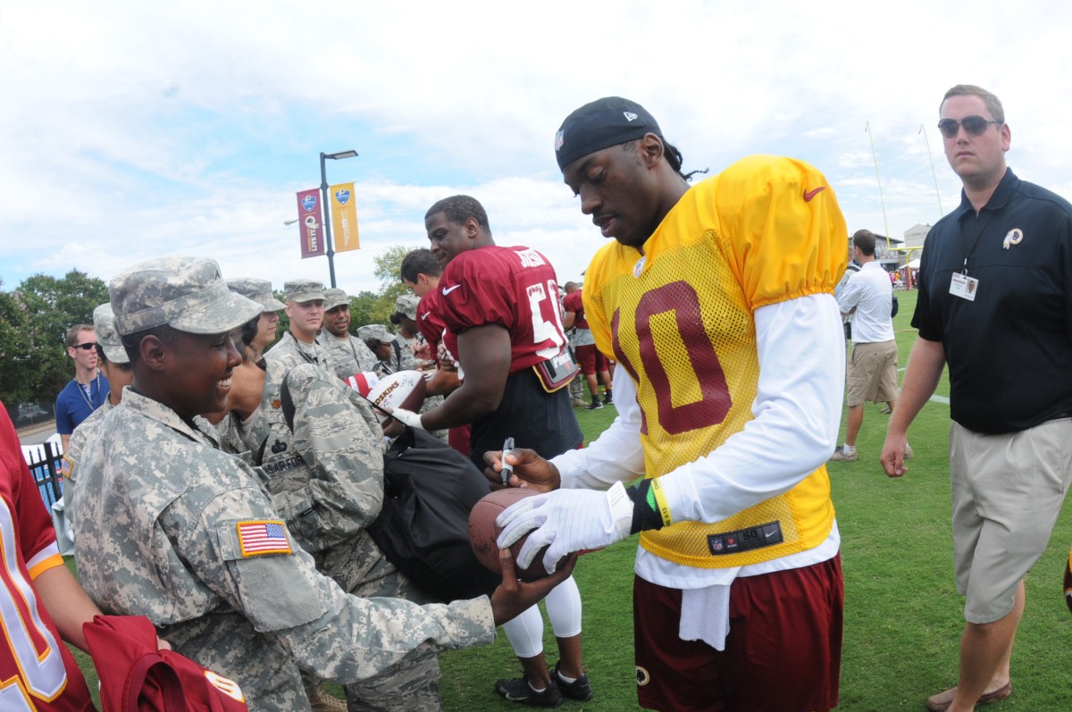 Top NFL players thank military during special training camp visit ...