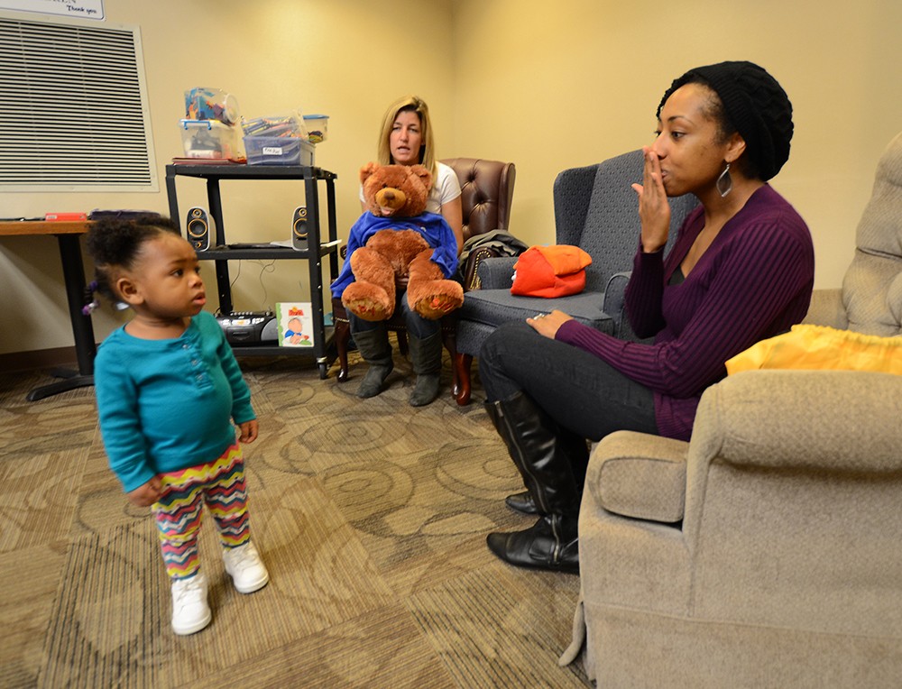 Military youth and family members romp, stomp and learn sign language ...