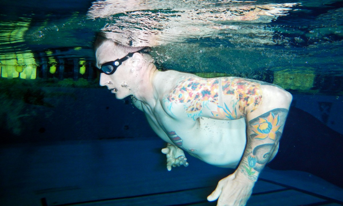 Sgt. First Class Armstrong aces his swimming exercise during the 2014 ...