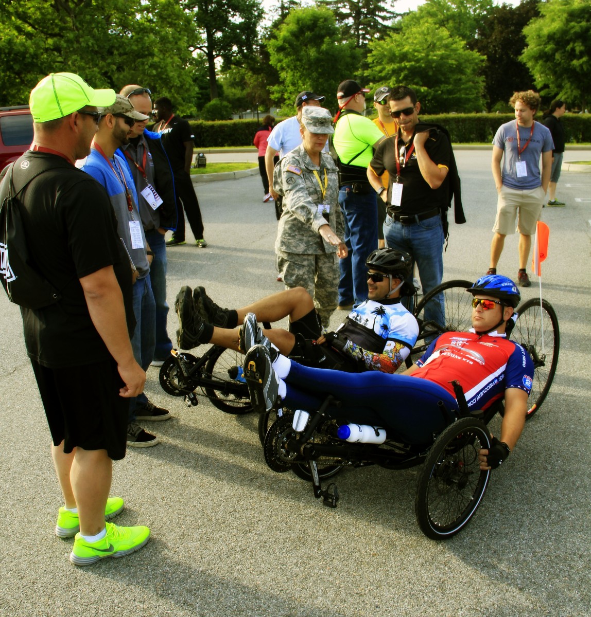 Army athletes line up their recumbent bikes before the start of the ...