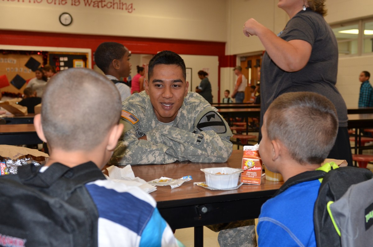 Cav assists children for first day of school | Article | The United ...