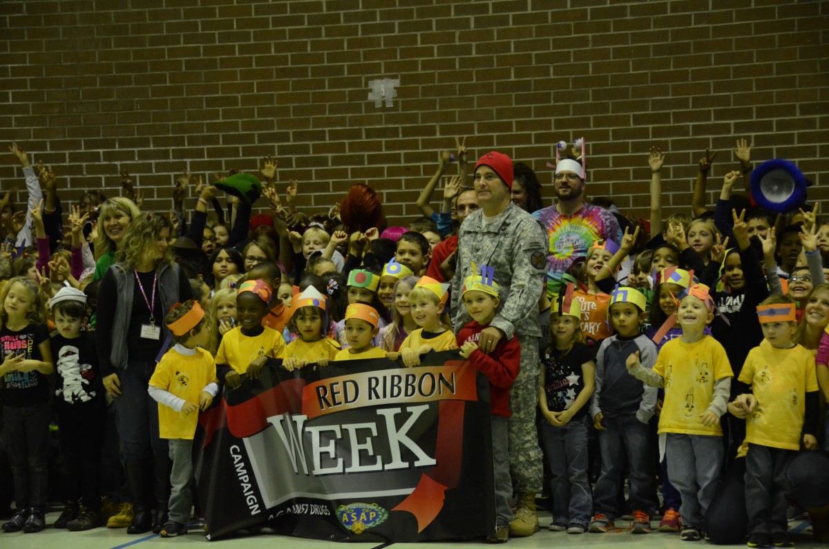 Rainbow Elementary students show true colors by pledging during Red ...