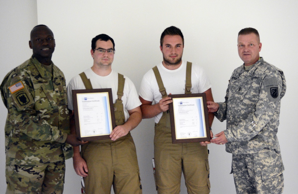 Two Germans complete three-year IT apprentice program, three more begin ...