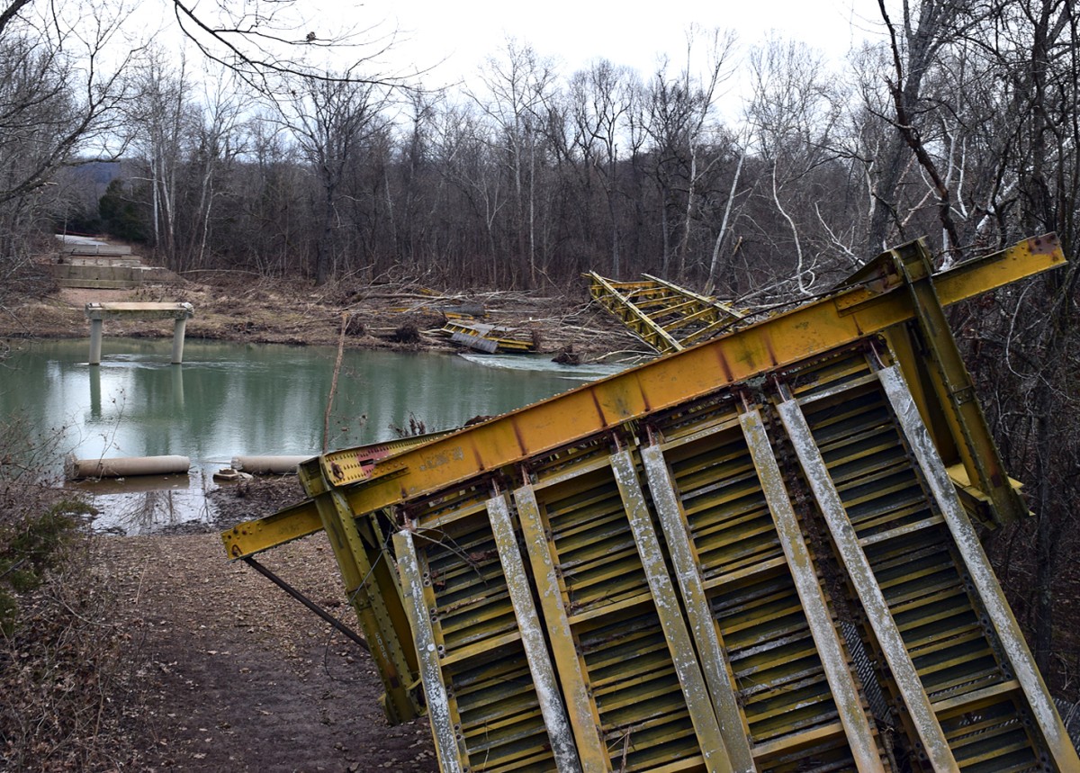Flood waters topple bridge, damage roads | Article | The United States Army