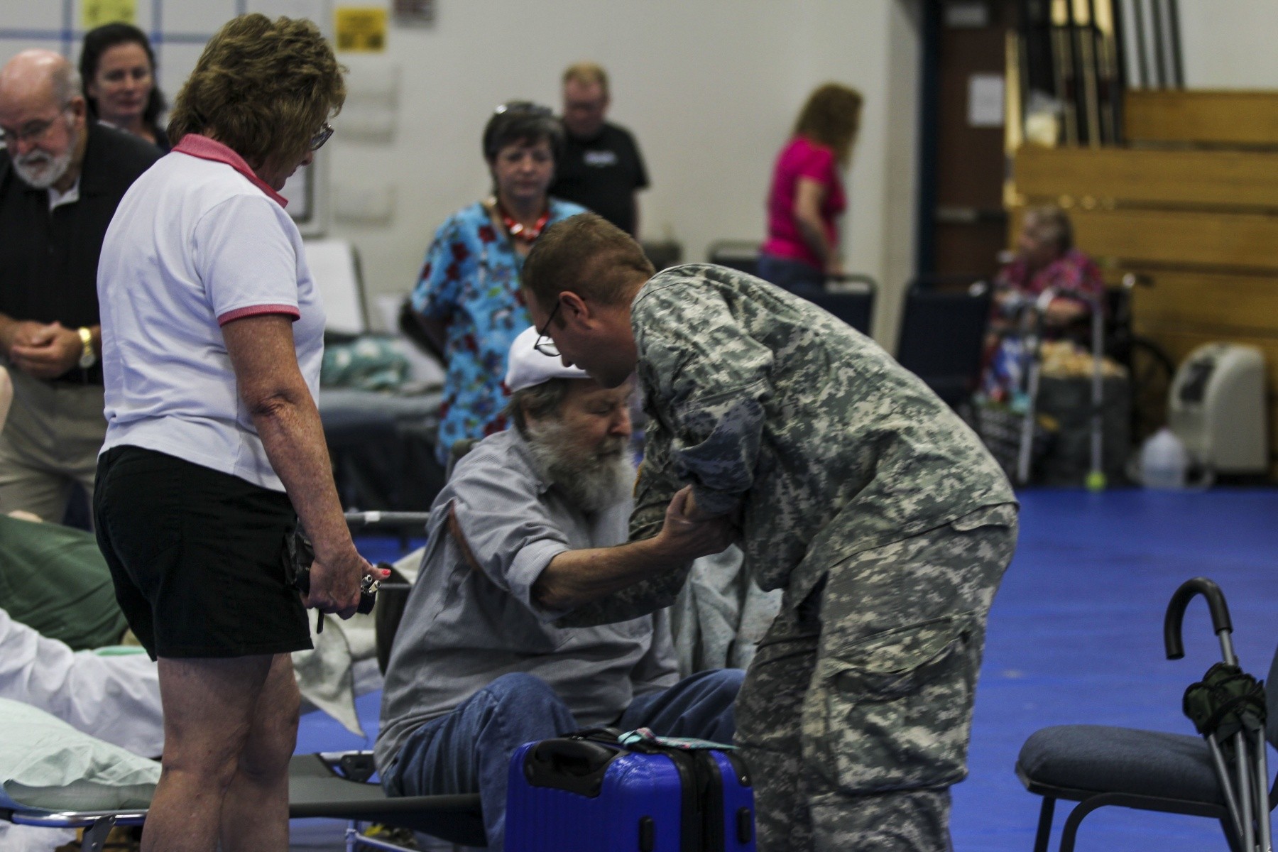 Citizens and Soldiers Come Together as a Community after the Storm ...