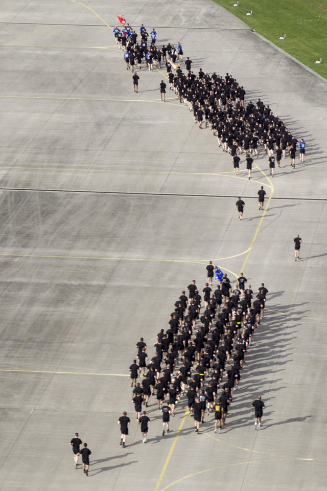 Around the world, 10th Combat Aviation Brigade Soldiers run as one team ...