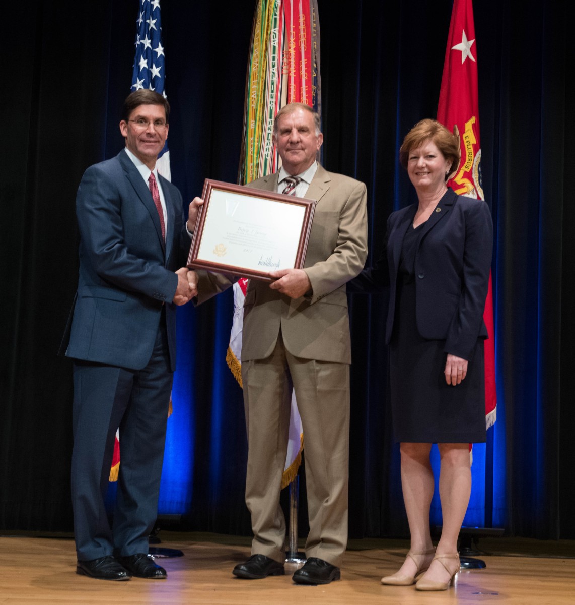 Former contracting center director receives Presidential Rank status ...