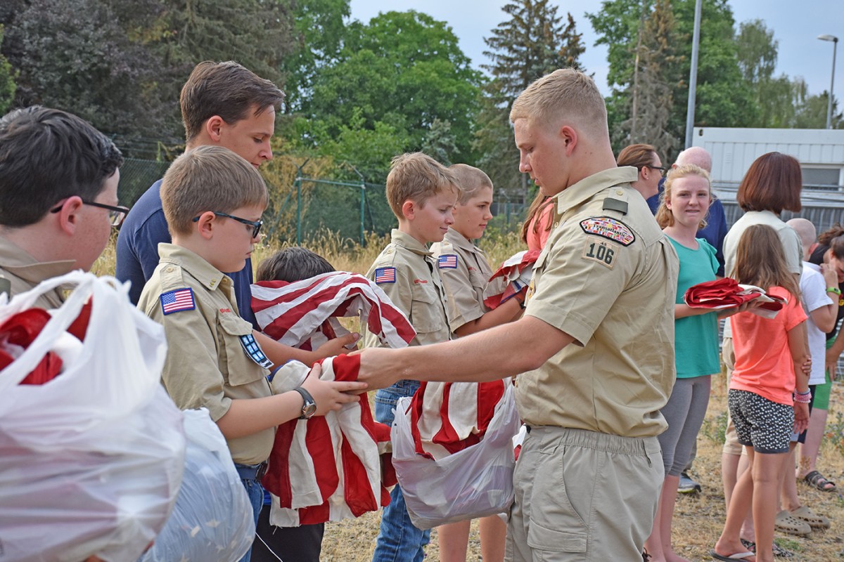 Future Eagle Scout hosts flag-disposal ceremony on Clay North | Article ...