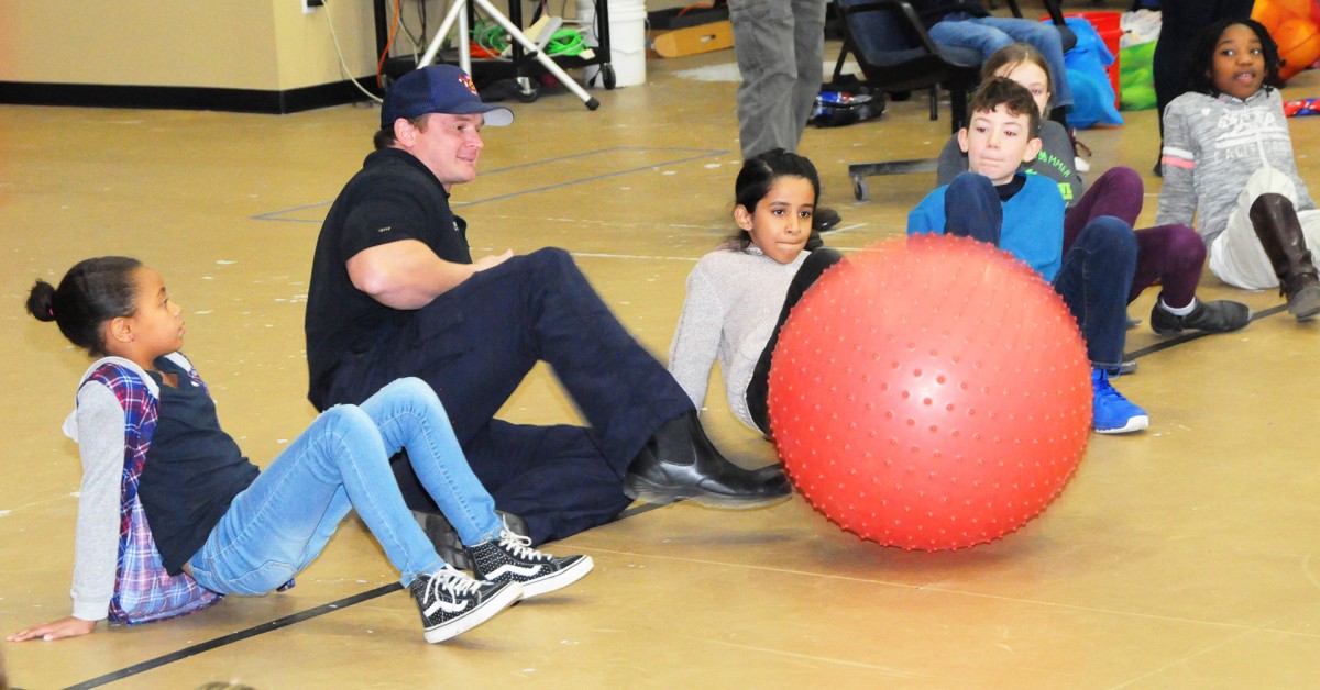 Firefighters join elementary school students in team building exercises ...