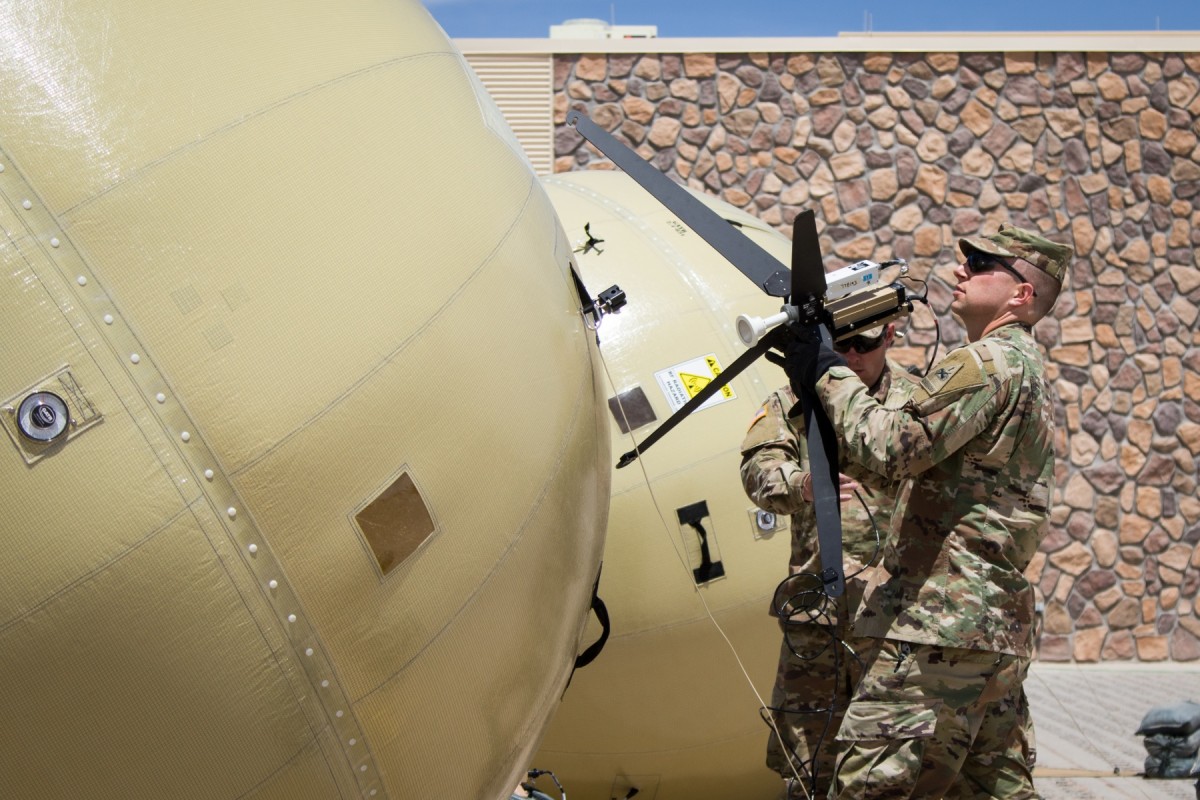 Communications in motion: Iron Soldiers train on inflatable satellite ...