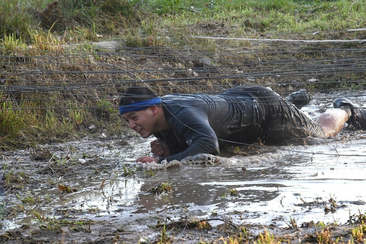 Masked in mud: Getting down and dirty at Fort Drum’s Mountain Mudder ...