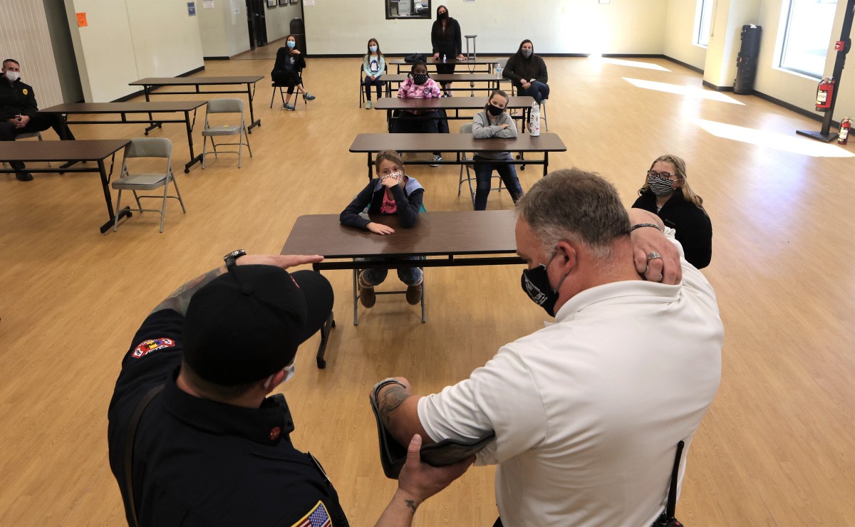 Local Girl Scouts learn basic fire, medical first aid techniques from ...
