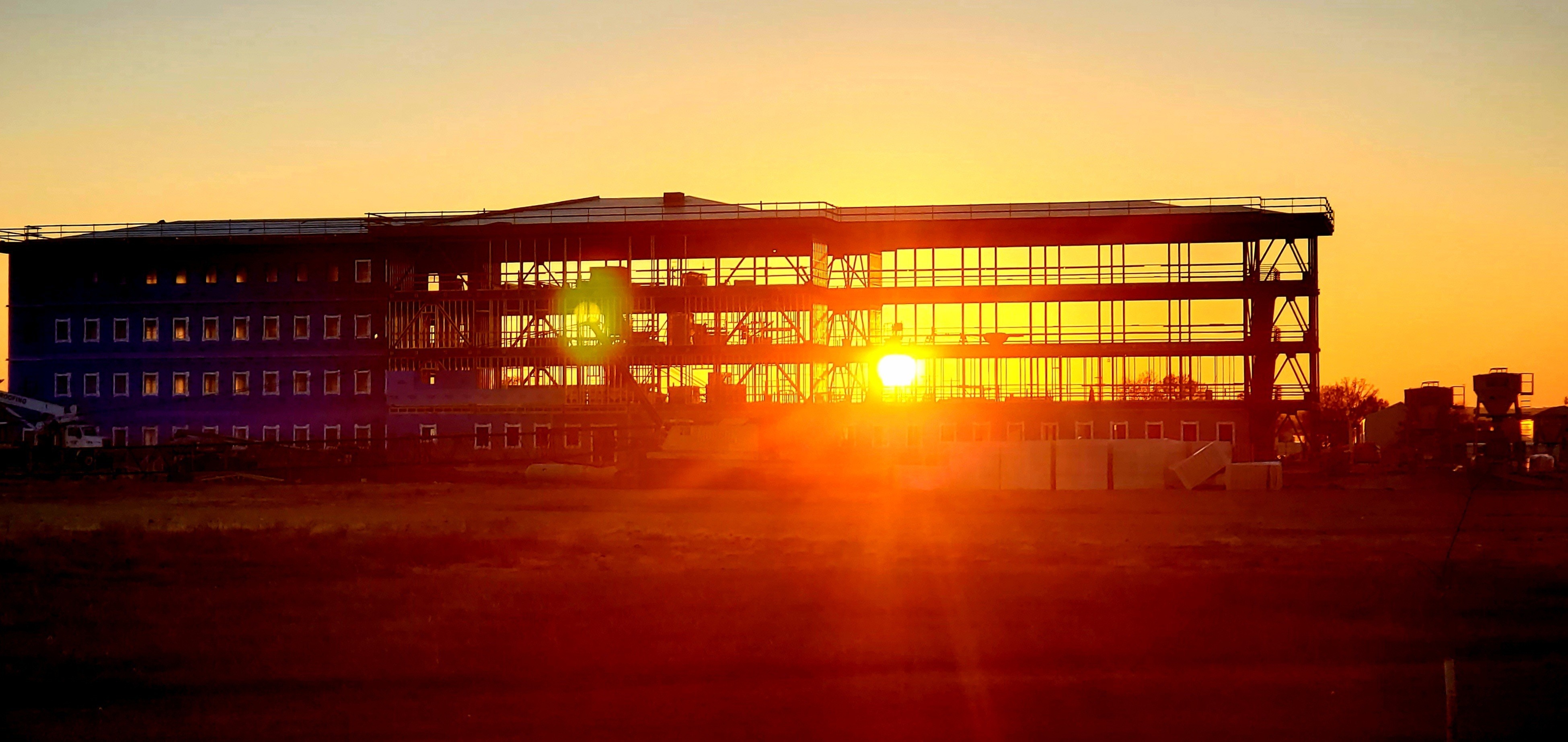 Photo Essay: Sun sets on another day of barracks construction | Article ...