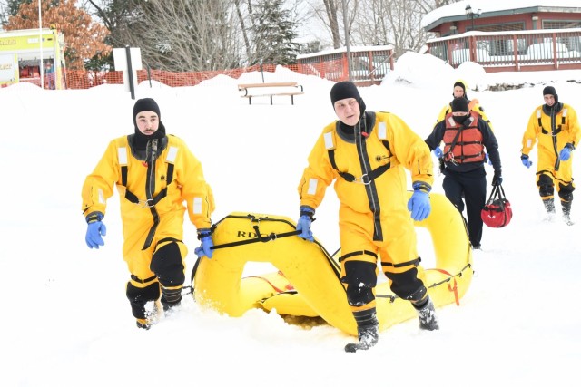Fort Drum firefighters train on Remington Pond for cold-weather rescues ...