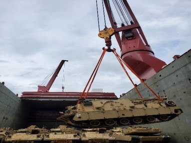 Transportation specialists accomplish massive, three- vessel loading ...