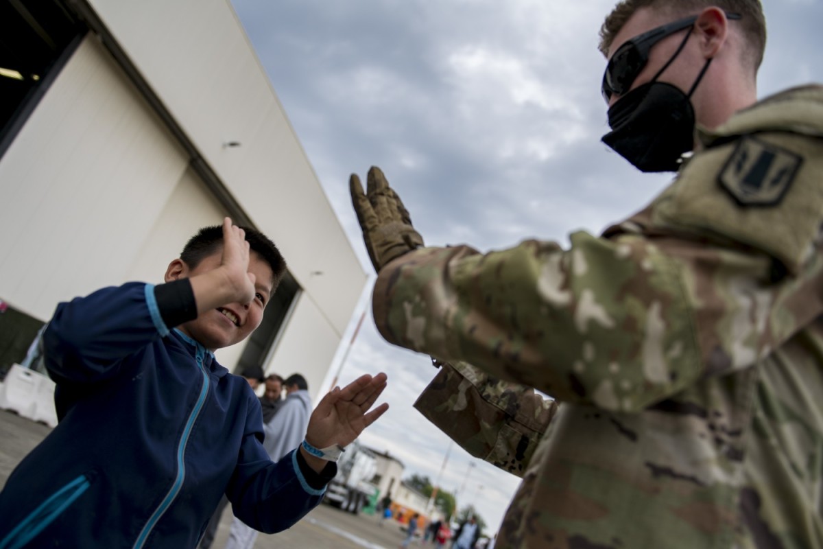 Soldiers put down their arms to raise others up | Article | The United ...