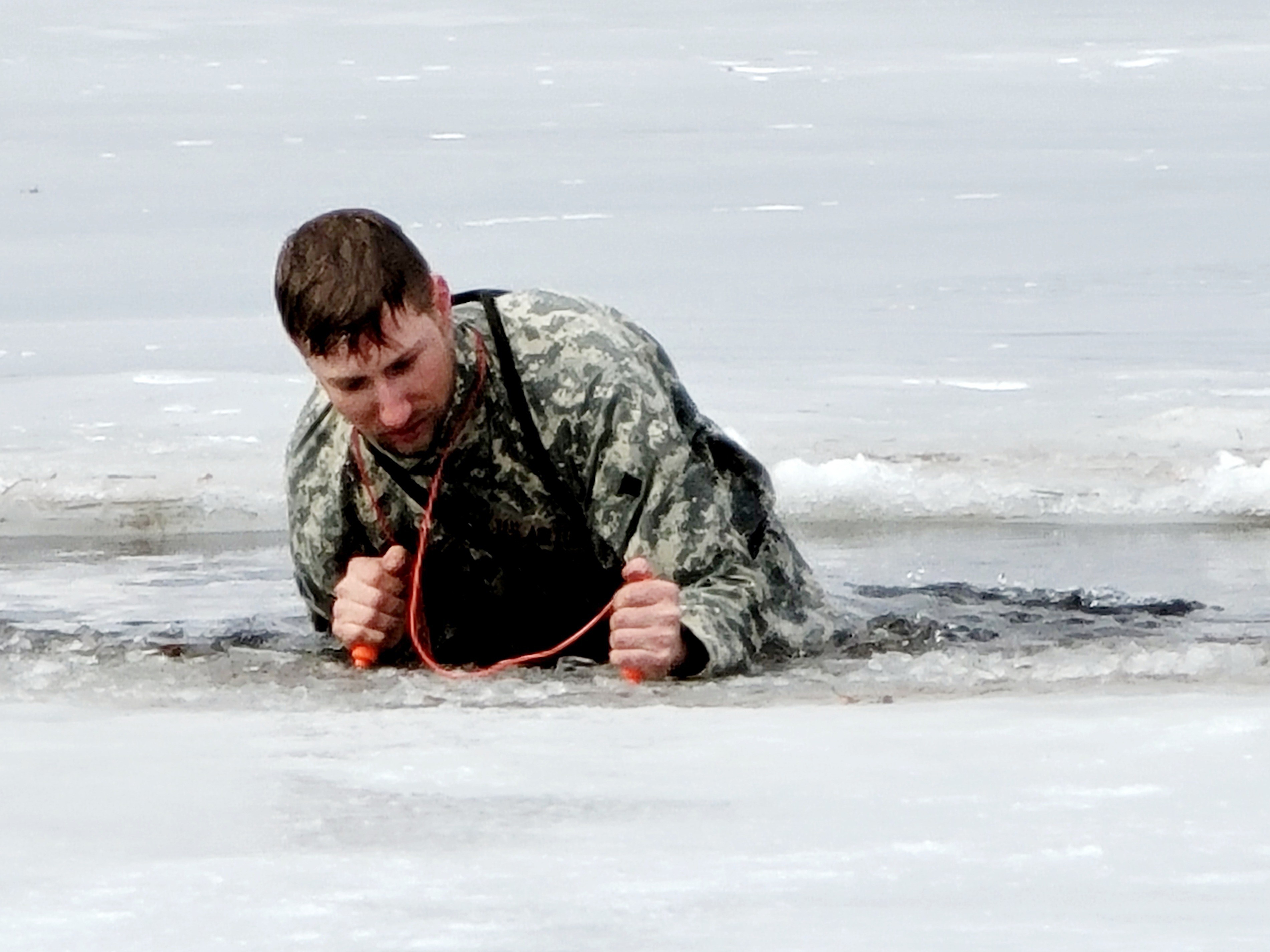 Cold-Weather Operations Course students jump in for cold-water ...