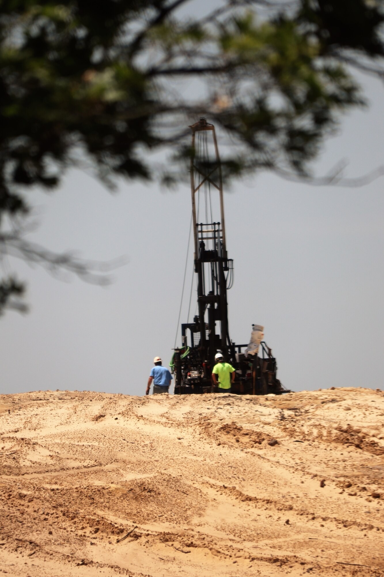 Contractors drill soil samples at troop project site at Fort McCoy ...