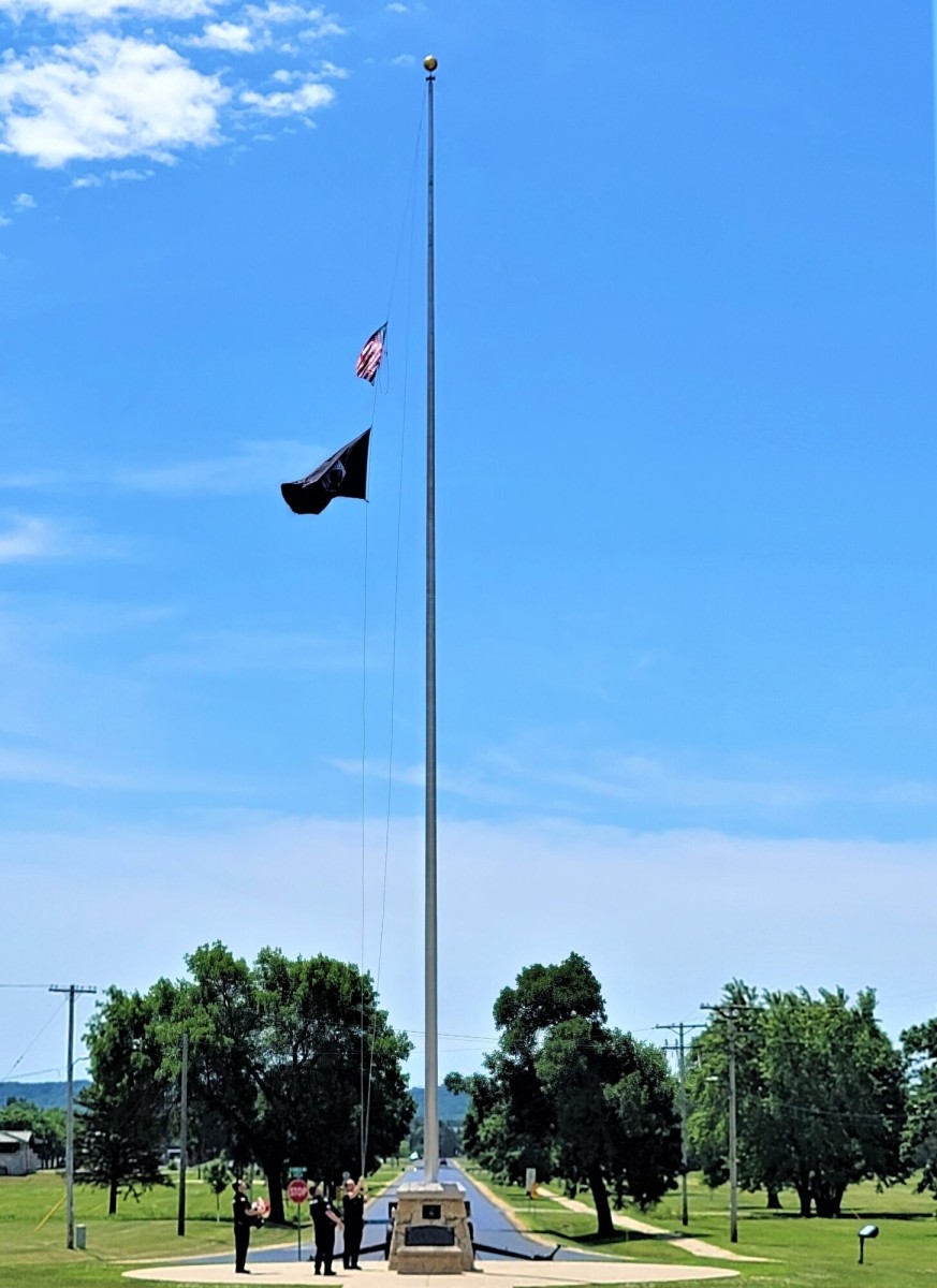 Photo Essay: Fort McCoy police fly special flag for department ...