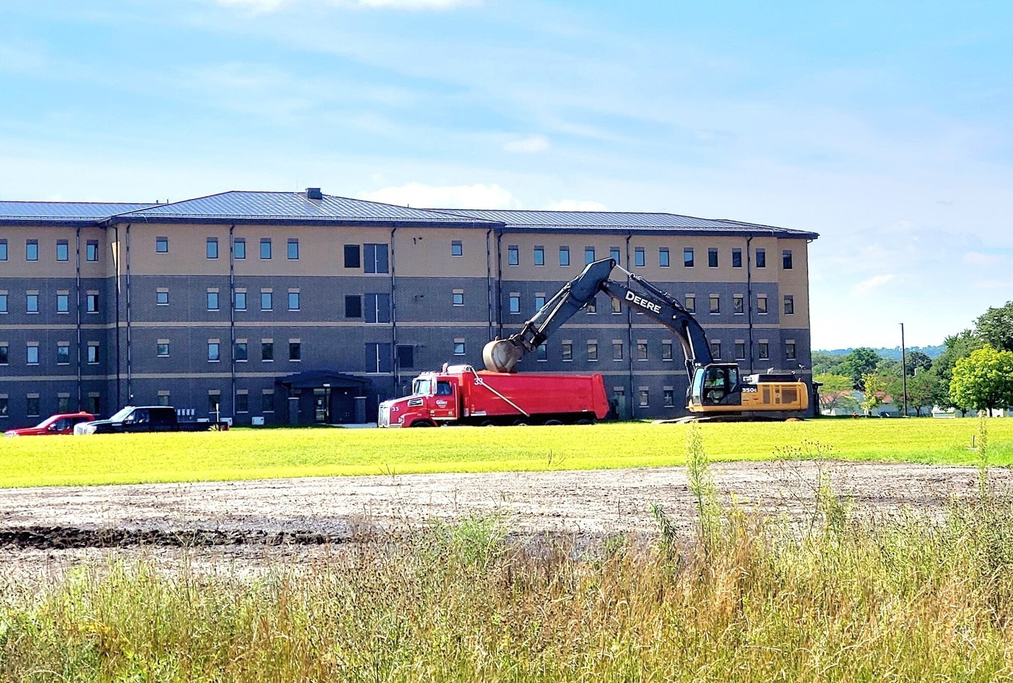 Final exterior grading takes place at fiscal year 2020-funded barracks ...
