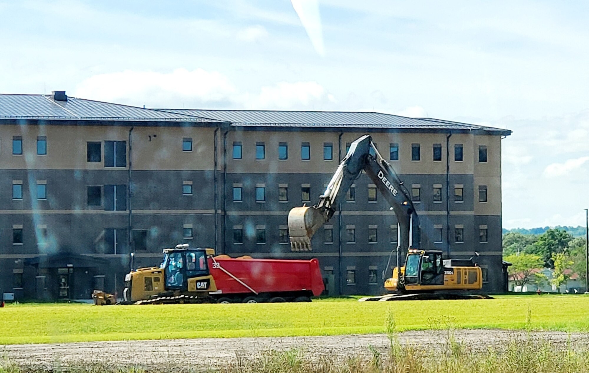 Final exterior grading takes place at fiscal year 2020-funded barracks ...