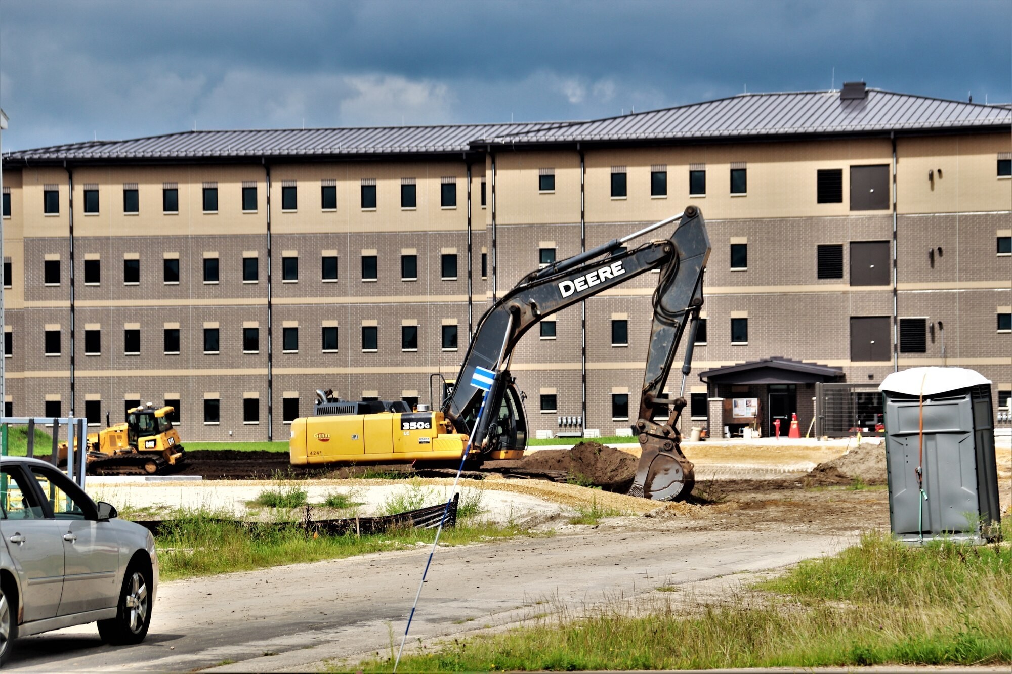 Final exterior grading takes place at fiscal year 2020-funded barracks ...