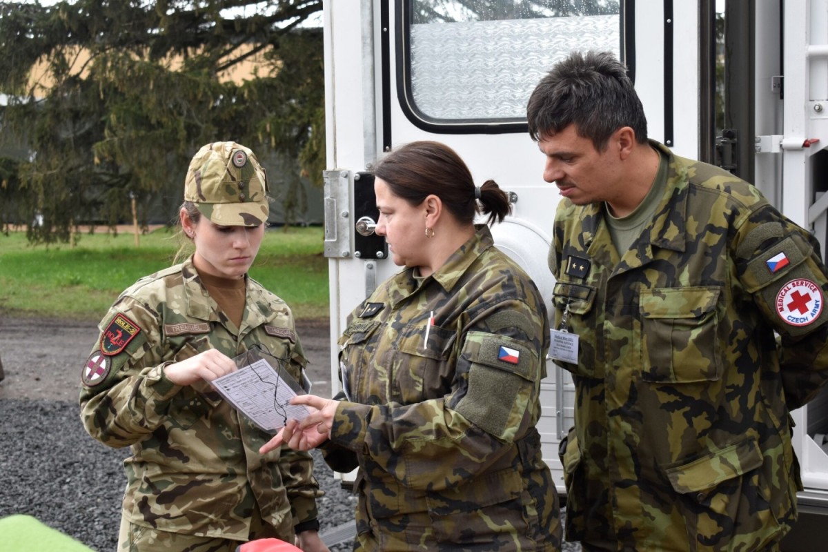 US medical evaluators work with multinational counterparts to evaluate ...