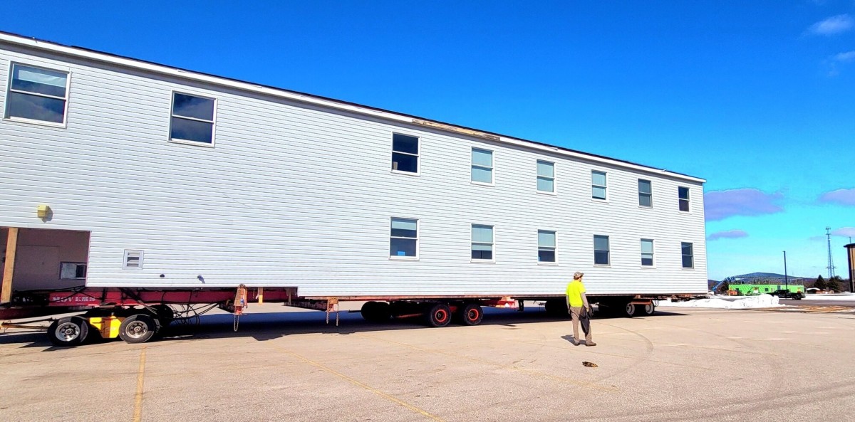 Photo Essay: Contractors move second World War II-era barracks building ...