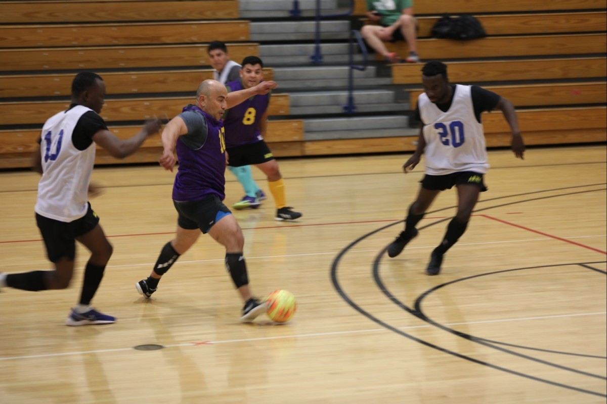Soldiers unite on the indoor soccer battlefield in pursuit of the ...