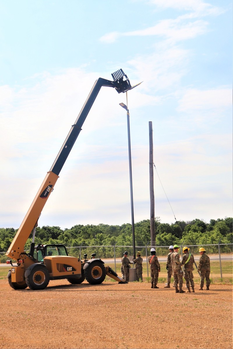 389th Engineer Company supports troop project to install light poles in ...