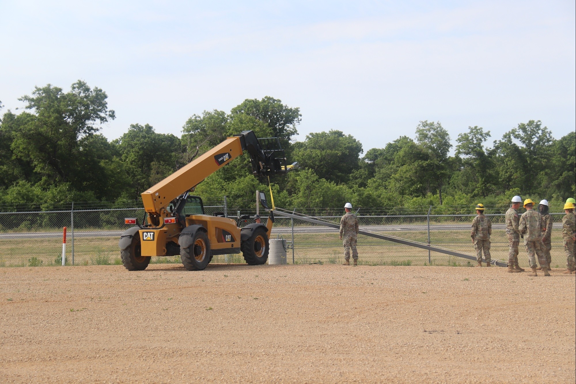 389th Engineer Company supports troop project to install light poles in ...