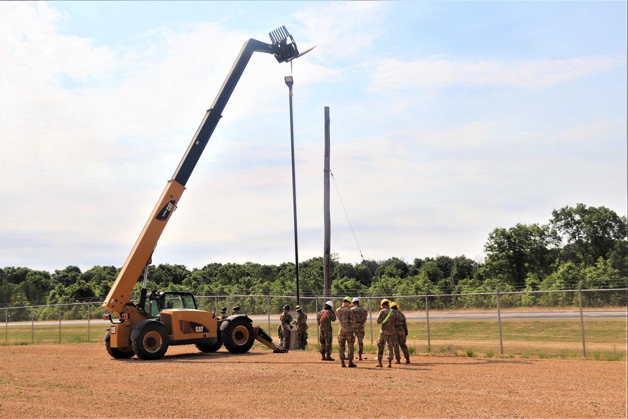 389th Engineer Company supports troop project to install light poles in ...