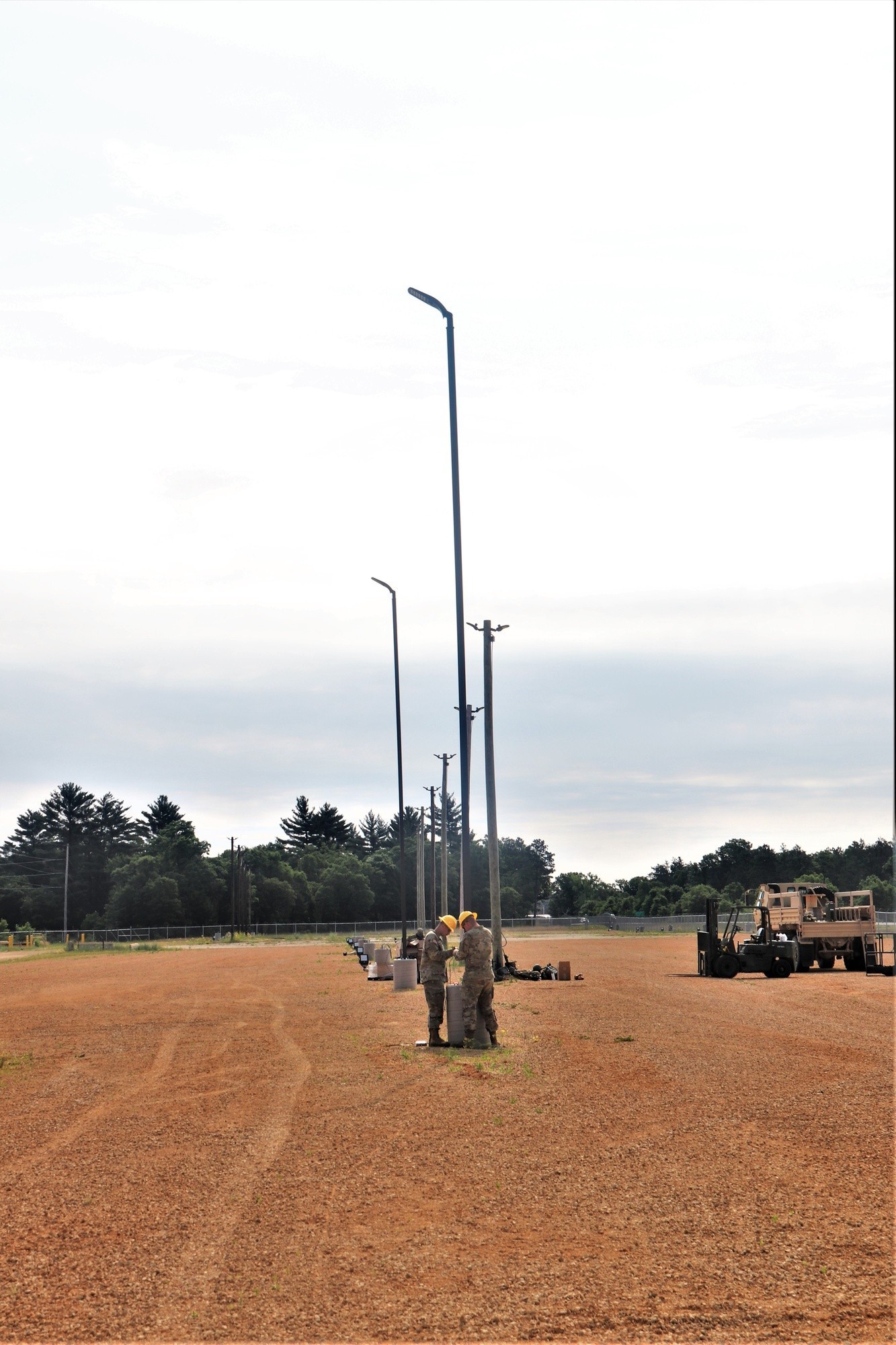 389th Engineer Company supports troop project to install light poles in ...
