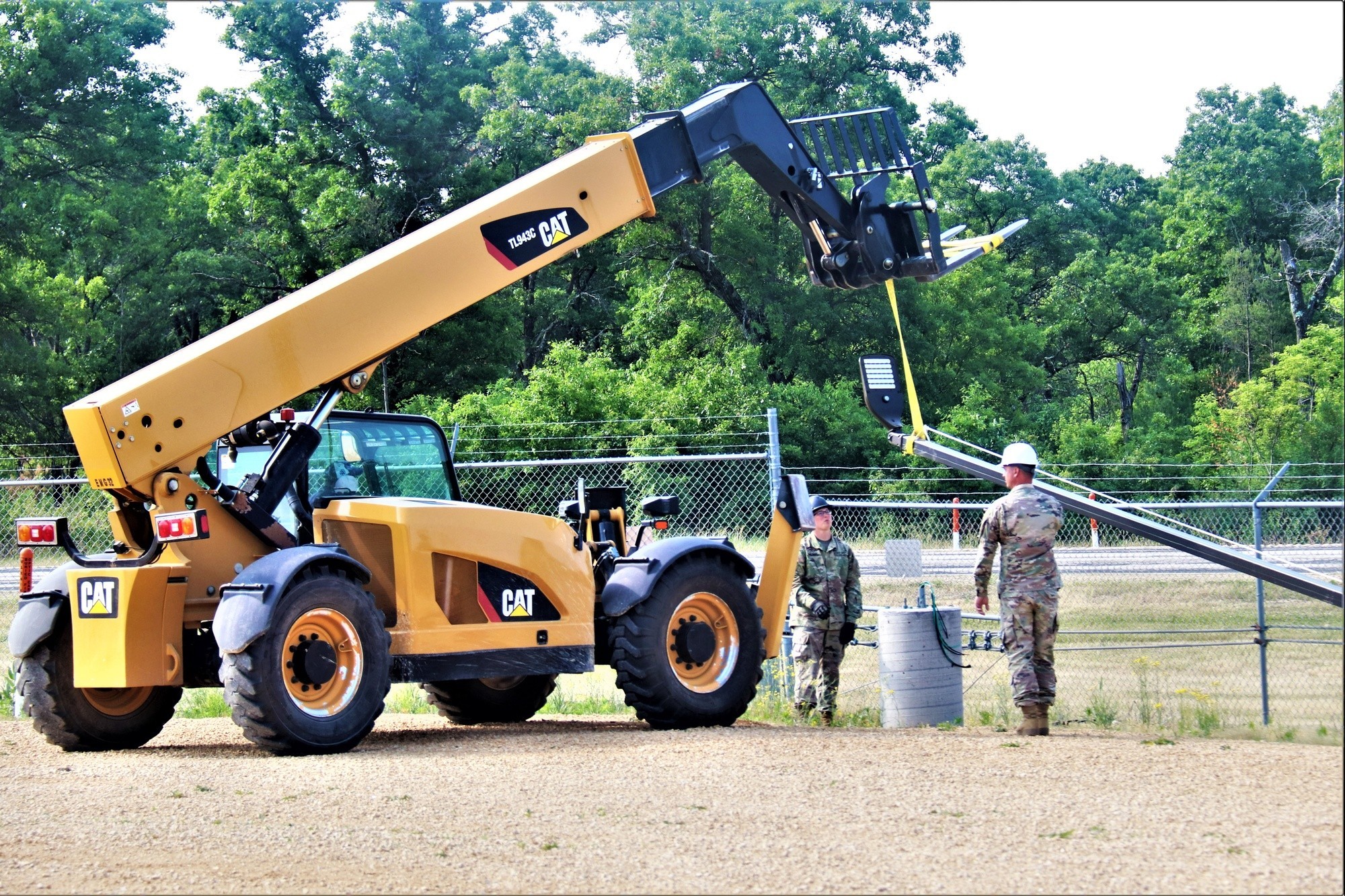 389th Engineer Company supports troop project to install light poles in ...