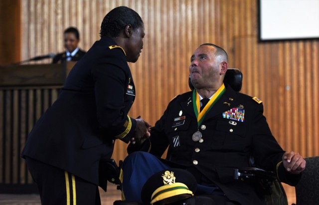 Wounded warrior receives one of the highest military police honors ...