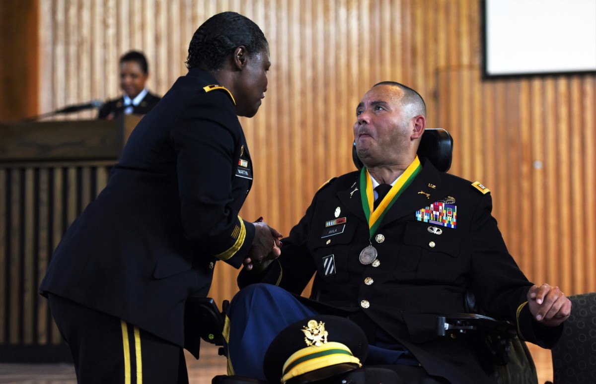 Wounded warrior receives one of the highest military police honors ...