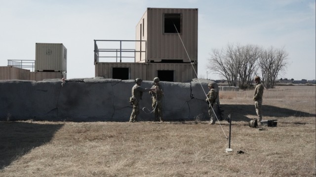 Interagency Explosive Ordnance Disposal techs dispose of aerial bombs ...